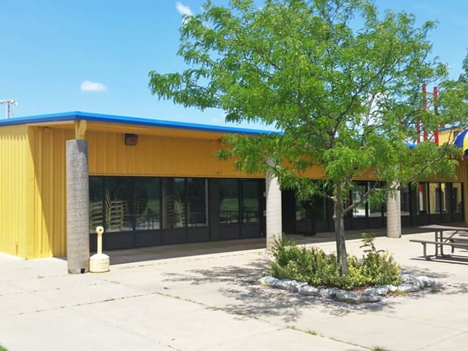 Bright yellow buildings against Kansas blue skies &ndash; like a beacon calling to your inner speed demon.