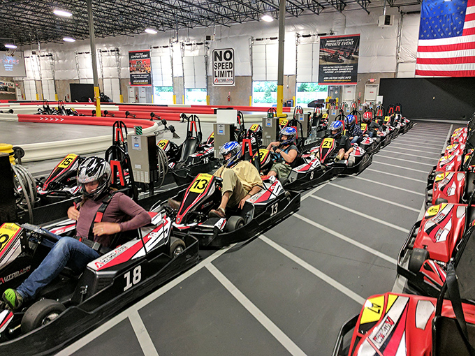 Spectators watch with a mix of excitement and envy as racers prepare for their moment of glory. That look of concentration says it all: "Move over, NASCAR."