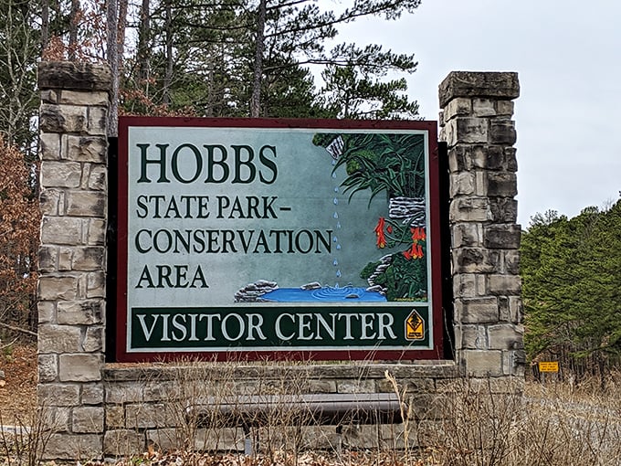 The entrance sign promises adventure, but doesn't spoil the surprise. Like a movie trailer that shows just enough to get you hooked.