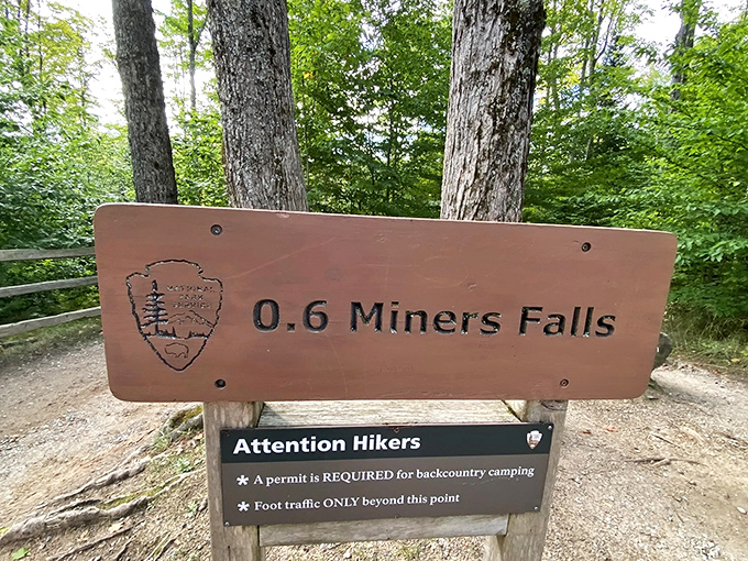 "0.6 miles to magic" promises this unassuming sign. The best adventures often begin with the simplest invitations.