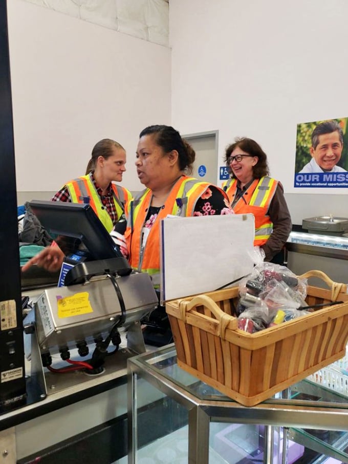 The unsung heroes in safety vests keep this thrifting paradise running smoothly, sorting treasures from thousands of donations daily. 