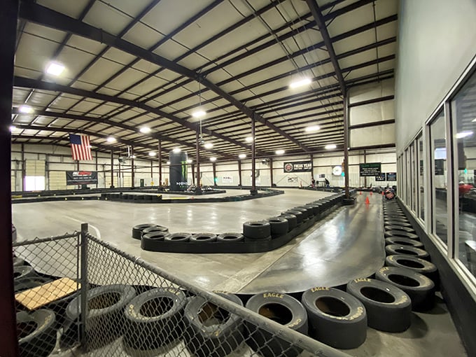 Tire barriers line the track like rubber sentinels, protecting racers from their own Formula One fantasies gone awry.