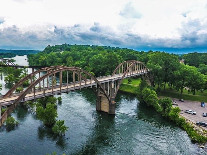 Nature's masterpiece frames human engineering&mdash;the rainbow arches of Cotter Bridge stretch across the White River like a scene from a travel magazine's centerfold.