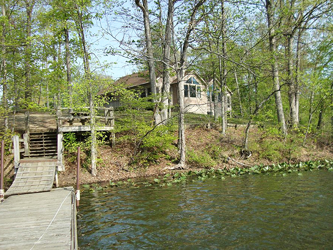 Lakeside dreaming at its finest. This cabin perched above the water offers the kind of morning view that makes coffee taste twice as good.