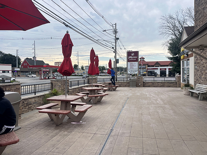 Outdoor serenity meets ice cream therapy. These picnic tables have witnessed countless "brain freezes" and the spontaneous friendships that form when strangers bond over exceptional desserts.
