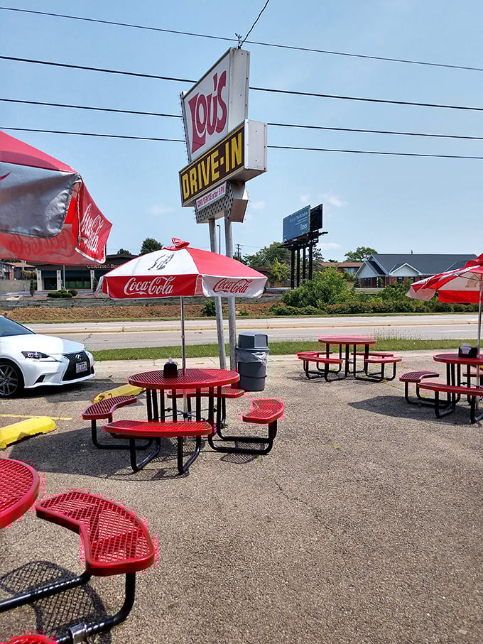 The red picnic tables aren't just seating&mdash;they're front-row tickets to summer's greatest show: classic American drive-in culture.