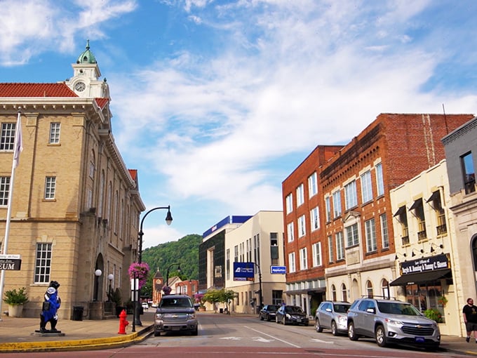 Main Street's colorful buildings stand like a welcoming committee, their facades telling stories of coal booms, family businesses, and Appalachian resilience.