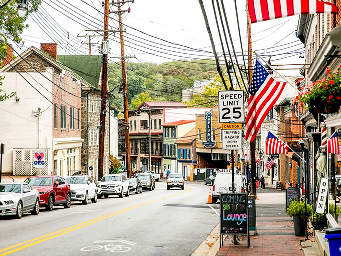 American flags flutter along the sloping thoroughfare, where 25 mph isn't just a speed limit&mdash;it's an invitation to slow down and savor the moment.