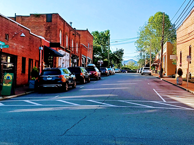 Strolling down Cherry Street feels like walking through a living postcard, with historic brick storefronts and the Blue Ridge Mountains standing guard in the background.