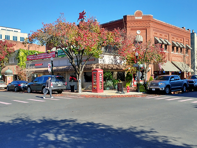That classic red British phone booth isn't lost—it's found its perfect home among El Dorado's vibrant downtown storefronts.