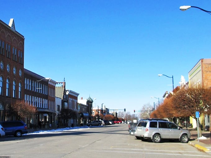 Window shopping becomes time travel on Pella's brick-lined streets, where storefronts could double as Amsterdam postcards.