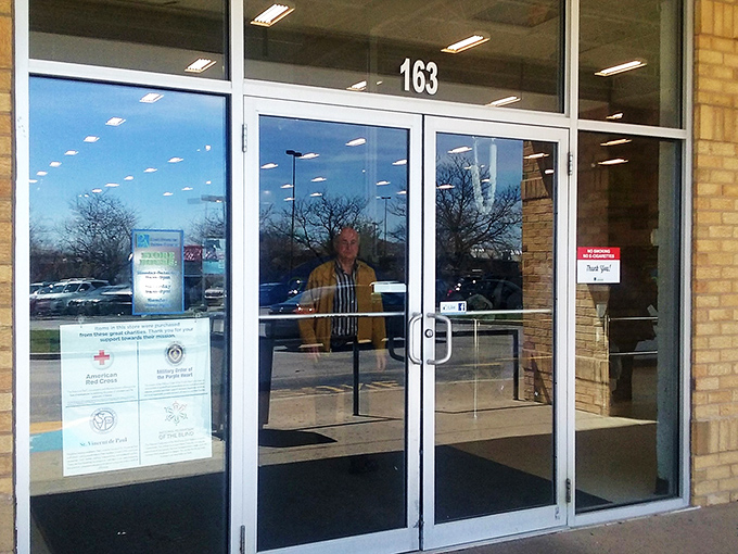 The gateway to possibility. Every shopping cart lined up at the entrance represents someone's future "you'll never believe what I found" story.
