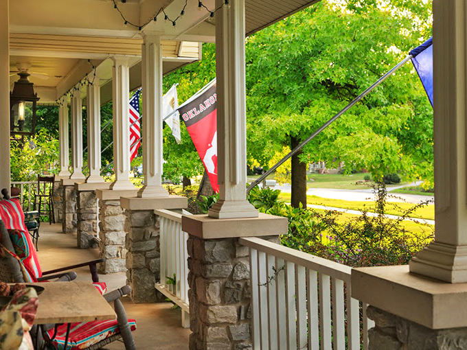 Rocking chairs that don't just say "sit a spell" but practically shout it—the front porch equivalent of a warm Oklahoma hug.