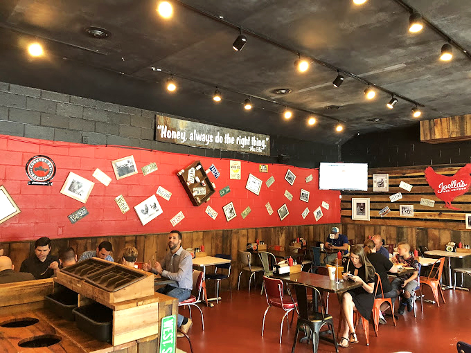 Inside, the "Honey, always do the right thing" motto watches over diners as they embark on their spicy pilgrimage. The rustic-industrial vibe feels like Nashville's cooler Kentucky cousin.