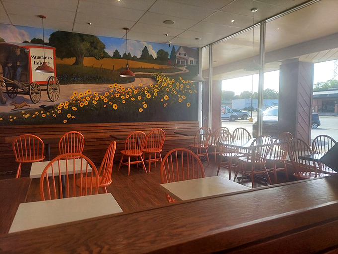 Sunflower murals and simple wooden chairs create an atmosphere that says, "Stay awhile, calories don't count when you're among friends."