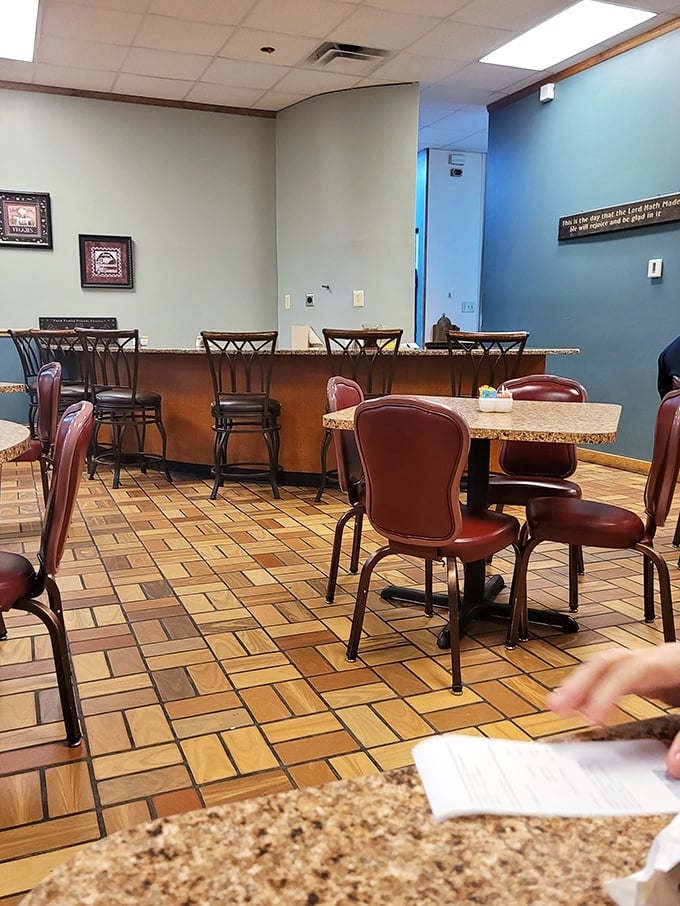 Warm lighting, classic artwork, and wooden chairs create that "Nonna's dining room" vibe. The kind of place where calories don't count and time slows down.