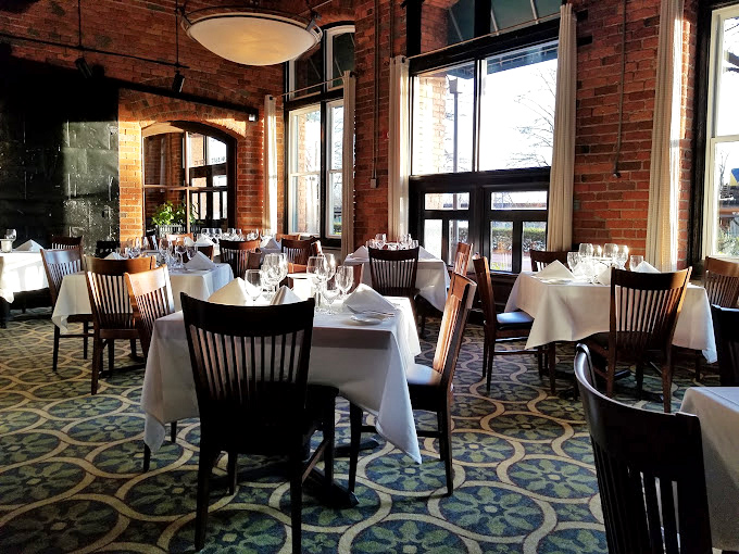 Red-and-white checkered tablecloths signal you're in for honest food, not culinary pageantry. No white tablecloths needed for perfection.