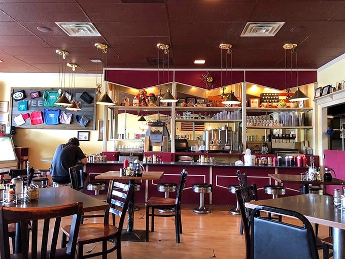 Inside, the warm wood tones and retro diner vibe create that rare space where both Ole Miss professors and hungover students can feel equally at home.