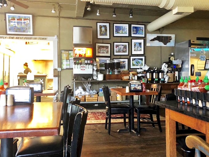 Inside Merritt's, time slows down. The wooden tables, local artwork, and North Carolina silhouette create a space where sandwich devotion is the only religion.