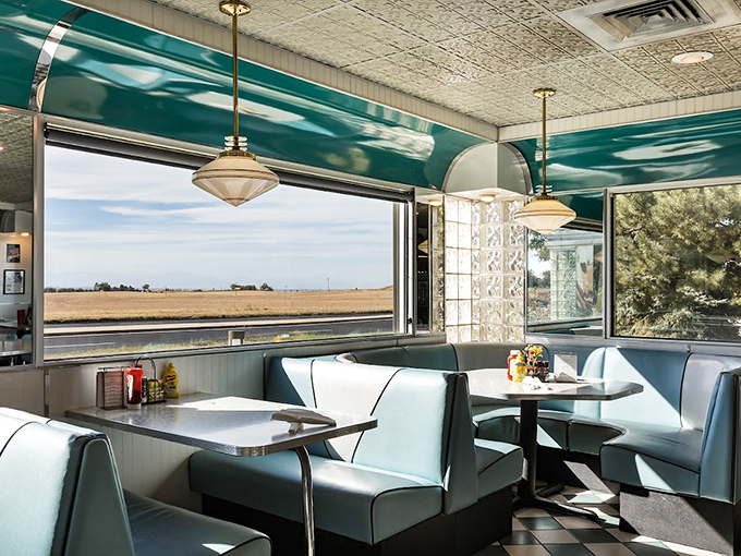 Time travel is possible after all&mdash;just slide into one of these mint-green vinyl booths with their pristine white piping. The glass blocks filter sunlight into a dreamy mid-century glow.