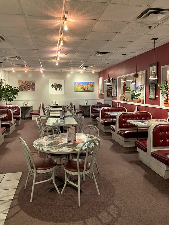 Industrial chic meets Italian warmth in this bustling dining room. The open kitchen concept lets you witness the pasta magic happening in real time.
