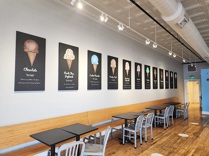 Clean lines, wooden accents, and artful ice cream portraits create a modern-nostalgic vibe that says, "Stay awhile, calories don't count here."