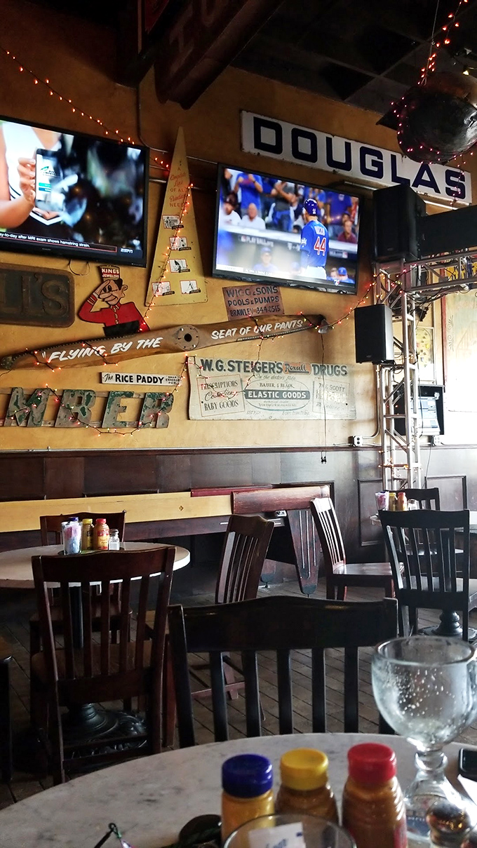 Inside Roscoe's, vintage signs and string lights create the perfect backdrop for sandwich worship. That "DOUGLAS" sign has witnessed more food euphoria than a cooking show judge.