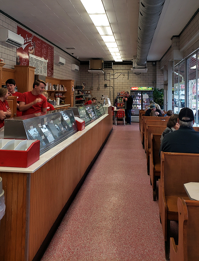 Step inside and time stands still. The vintage counter and wooden booths have witnessed countless "first lick" moments across generations.