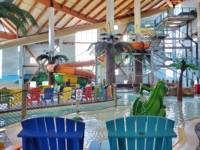Palm trees indoors in Kansas? It's like someone took a Caribbean postcard and made it three-dimensional, complete with rainbow-hued chairs for spectators.