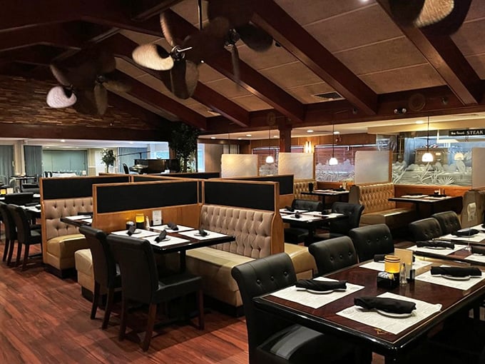 Inside, wood-beamed ceilings and comfortable booth seating create that perfect "special occasion that feels like home" atmosphere.