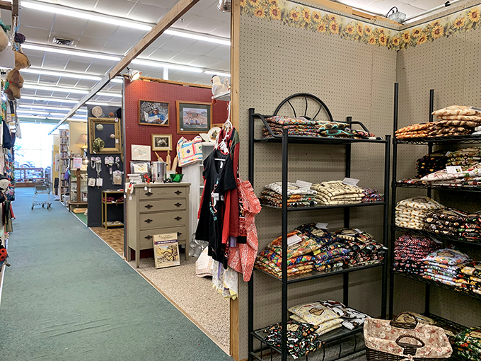 Long aisles stretch before you like pathways to the past, with each booth offering its own universe of vintage treasures and handcrafted delights.