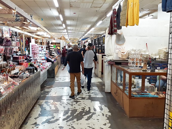 Narrow pathways create a treasure map through vendor stalls. Every aisle tells a different story, with characters who know the value of both merchandise and conversation.