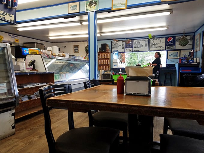 Step inside this blue-hued sanctuary where nautical charm meets seafood paradise. The wooden tables have witnessed countless "first bite" expressions of pure joy. 