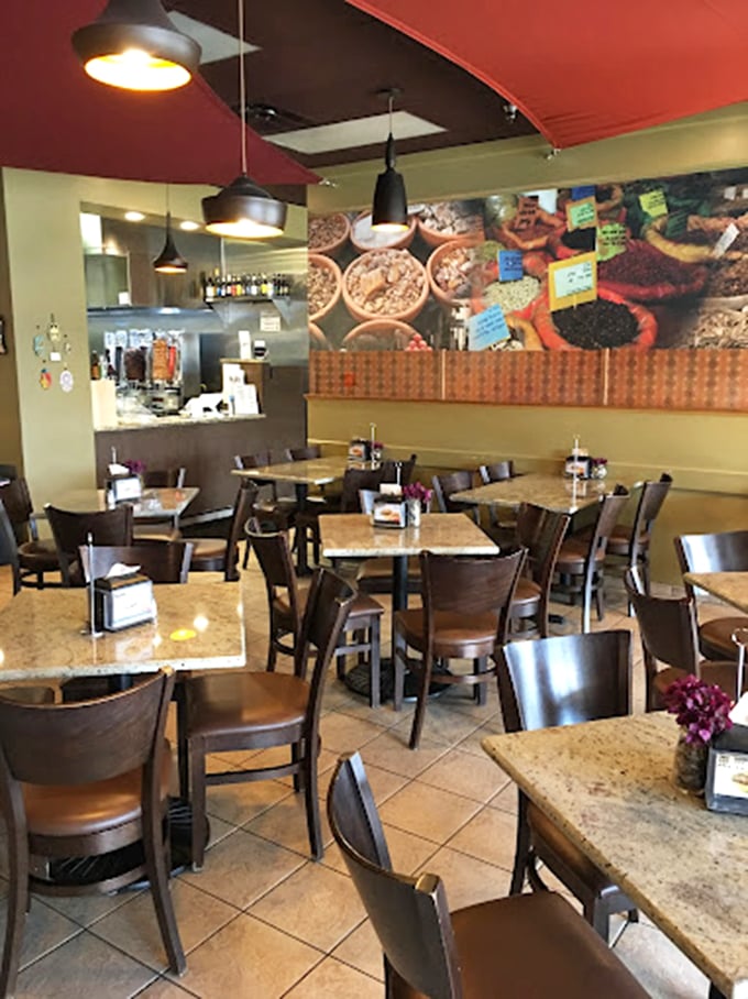 Modern meets traditional in Eli's comfortable dining room. Those colorful spice photos on the wall aren't just decoration&mdash;they're a preview of the flavor explosion to come.