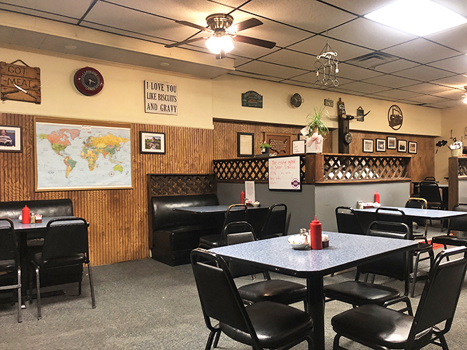 Where world maps meet biscuit declarations of love. This isn't interior design; it's comfort architecture at its finest.