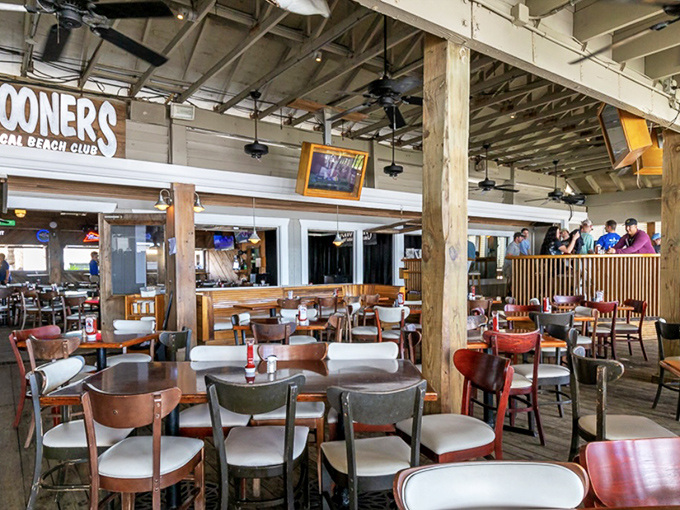 Inside, weathered wooden beams and casual seating create that perfect "I'm on vacation even if I live here" vibe that makes Florida dining special.