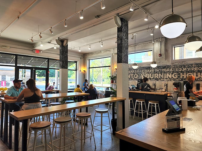 Modern industrial chic meets southern hospitality in this light-filled space where breakfast dreams become delicious reality.