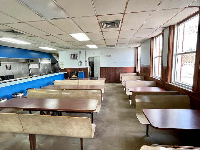 No-frills dining at its finest&mdash;these booths have witnessed countless first-time Garbage Plate experiences and the euphoric food comas that follow.