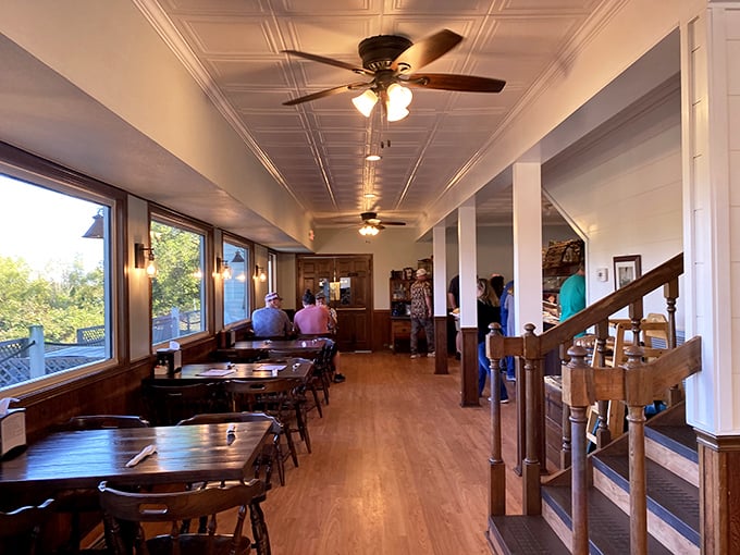Inside, wooden tables and ceiling fans create the perfect backdrop for serious eating. No distractions needed when the food does all the talking.