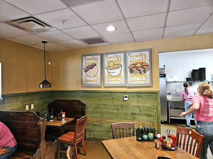 Inside, wood paneling and nostalgic signage create that perfect small-town diner atmosphere where calories don't count and everyone feels at home.