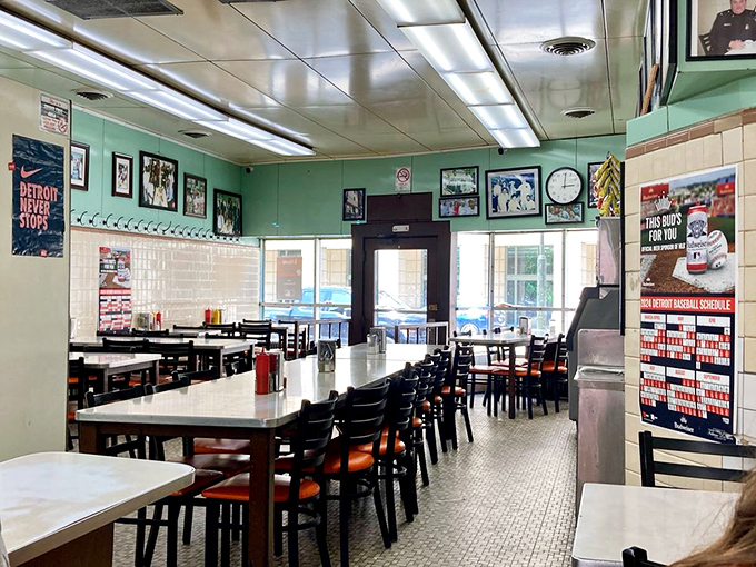 Simple mint-green walls adorned with Detroit sports memorabilia create the perfect no-frills backdrop for culinary magic. No Instagram filters needed here.