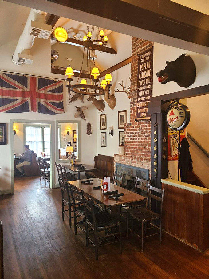 Step inside and you're instantly transported across the pond. Union Jack flag, mounted trophies, and British subway signs create an authentic pub atmosphere that screams "cheerio!"