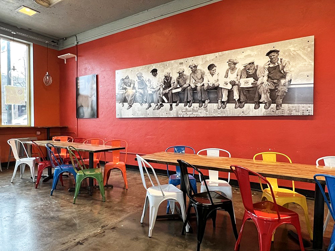 Industrial chic meets playful charm with rainbow-colored chairs and that iconic "lunch atop a skyscraper" photo. The perfect backdrop for sugar-induced euphoria.