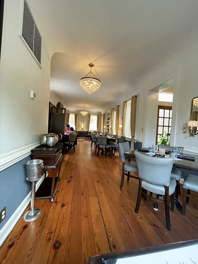 Sunlight streams through tall windows onto heart pine floors that have witnessed centuries of Charleston dinners. This isn't just a meal&mdash;it's a historical experience.