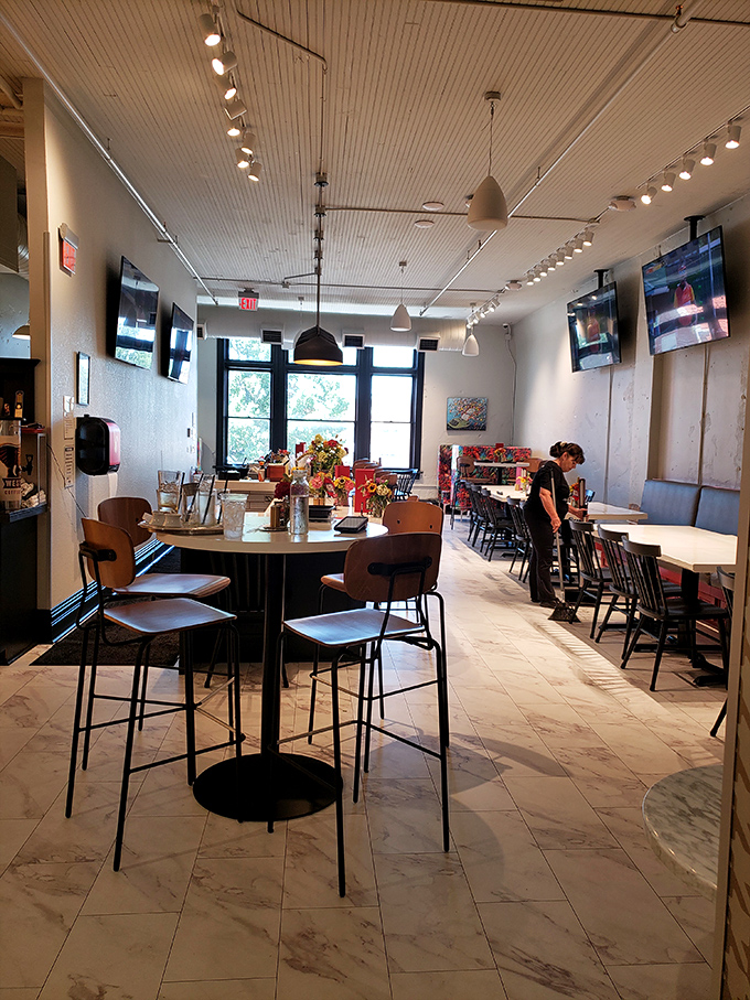 Clean lines, modern lighting, and thoughtful design create an atmosphere that whispers "big city chic" while maintaining small-town Arkansas warmth.