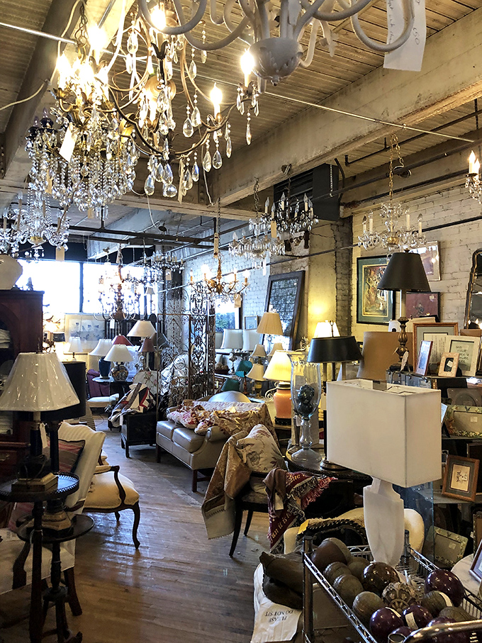 Crystal chandeliers dangling from factory ceilings create the perfect marriage between industrial grit and Gilded Age glamour.