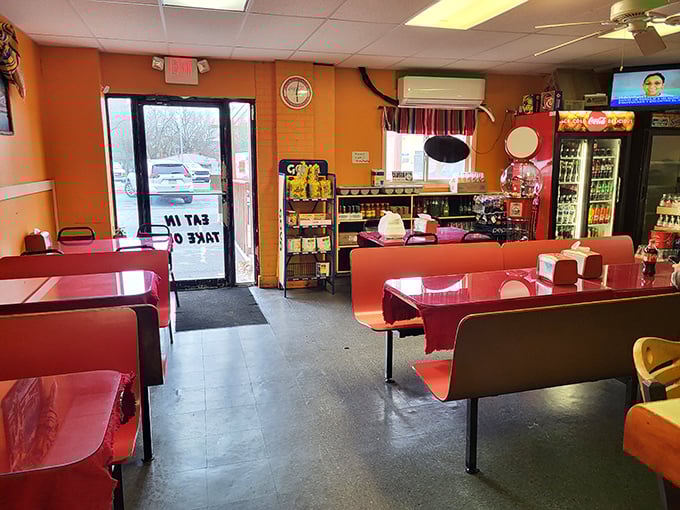 Simple, clean, and welcoming&mdash;these classic red booths have witnessed countless "first bite" moments of pure Mexican food bliss.