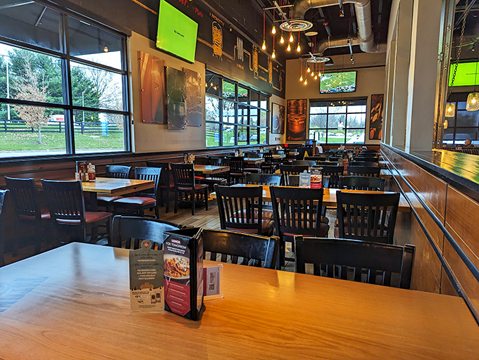 Spacious yet intimate, BJ's dining room balances modern industrial elements with warm wood tones&mdash;the perfect backdrop for your food adventures.