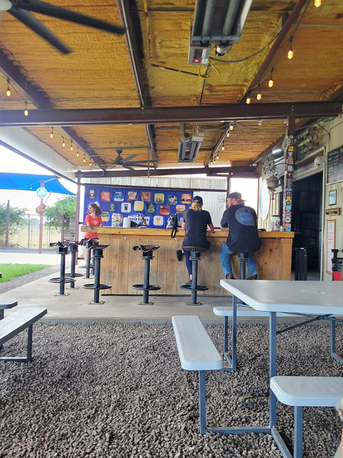 Pull up a stool at beer paradise. The rustic outdoor bar area invites you to settle in for an afternoon of sampling and storytelling.