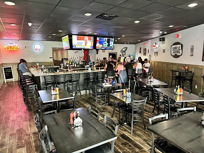 Inside, the warm wood paneling and no-nonsense seating create that perfect "everybody knows your order" vibe that chain restaurants spend millions trying to fake. 
